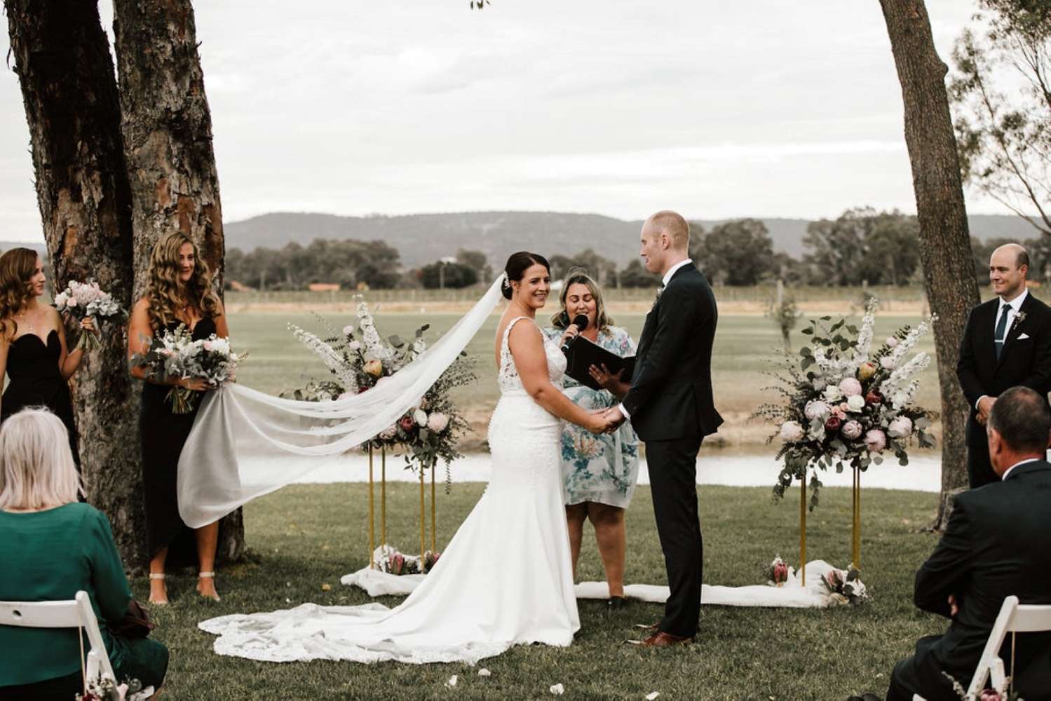 CeremonywithflowertowersAnneliezebarronOakoverestate - Flower Nation
