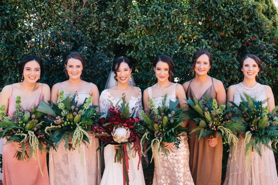 MaidsandBrideTropicalfoliagebouquetandburgundybridalBirdonthewall ...